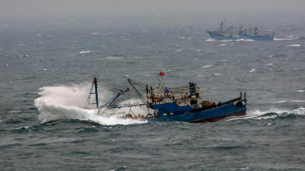 Philippines civil group raises flag on disputed sandbar as China and ...